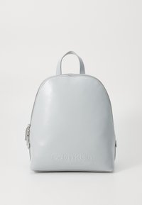 Calvin Klein EMBOSSED ROUND BACKPACK - Rucksack - mirage gray/grey ...