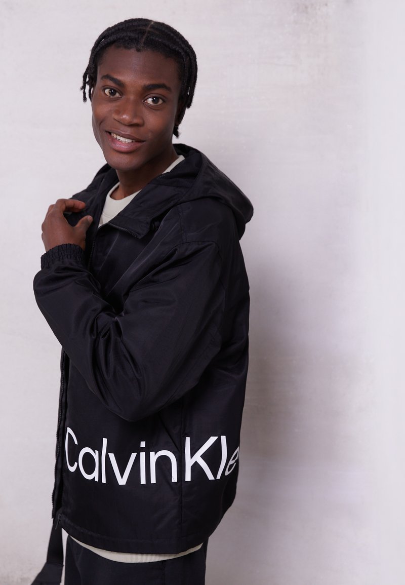 Calvin Klein Jeans COLORBLOCK JACKET - Summer jacket - black - Zalando ...