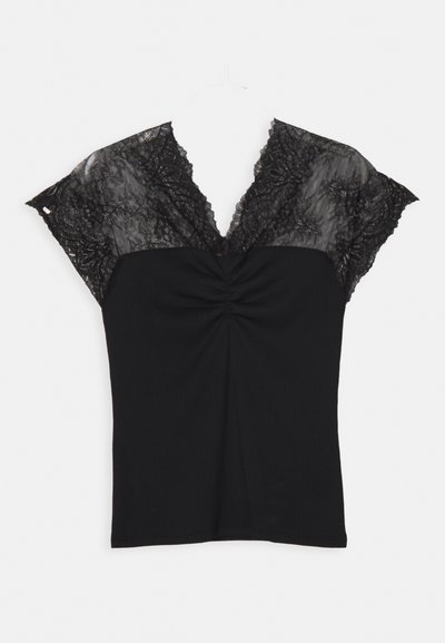 maje LILIONA - T-shirt med print - noir/svart - Zalando.se