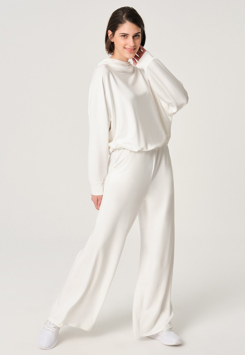 DAGI Tracksuit bottoms - ecru/tan - Zalando.ie