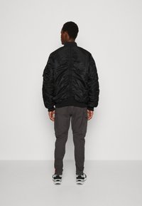 Alpha Industries MA-1 PUCKERED - Bomberjacke - black/schwarz - Zalando.de