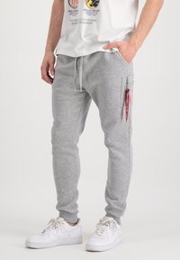 Alpha Industries NASA CARGO - Tracksuit bottoms - grey heather/grey ...