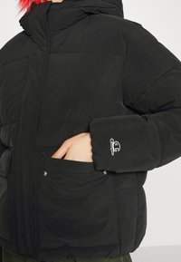 Champion Rochester HOODED JACKET - Winterjacke - black/schwarz - Zalando.de
