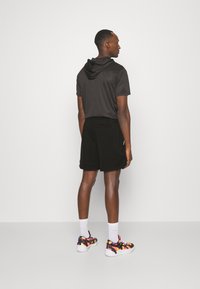 Puma RALPH SHORT - kurze Sporthose - black/schwarz - Zalando.at