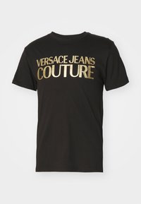 Versace Jeans Couture LOGO - Trükipildiga T-särk - black/gold-coloured ...