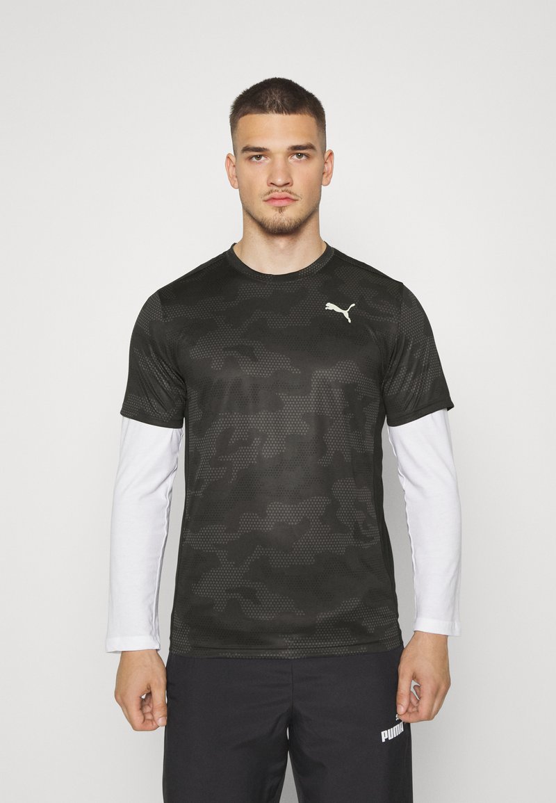 Puma TRAIN OFF SEASON - Sports T-shirts - black/sort - Zalando.dk