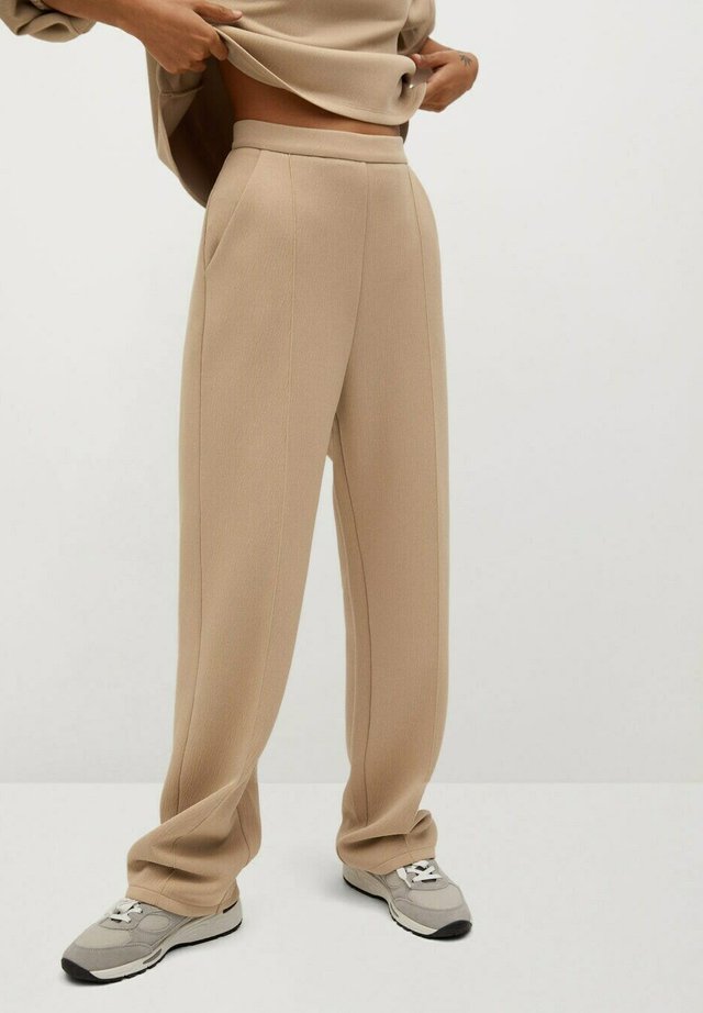 Pantalones beige online | Gran selección para mujer en Zalando