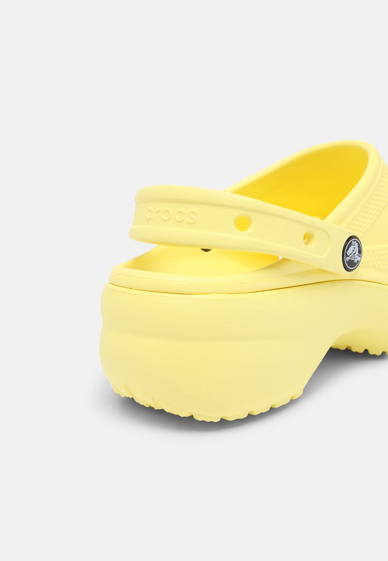 Crocs™ And Crocband Clog Platform Shoes In Yellow Lyst