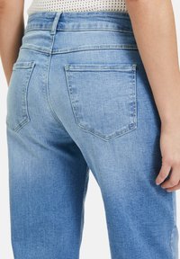 Cartoon MIT EINGRIFFTASCHEN - Jeans Straight Leg - blau - Zalando.ch