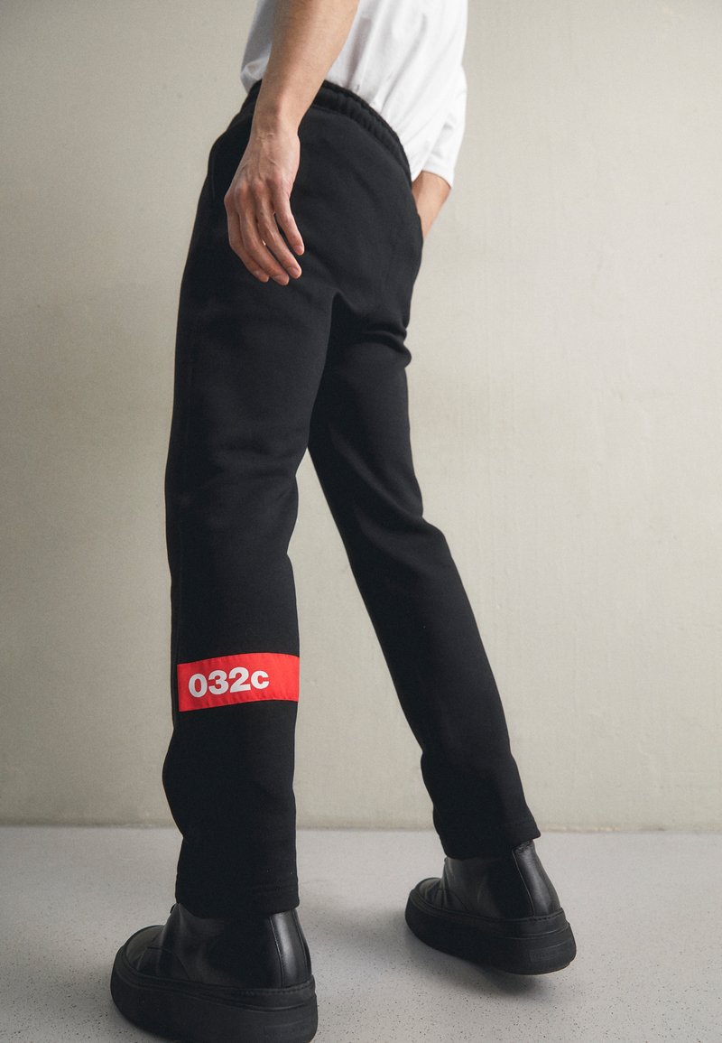 032c TAPED SOFT JOGGER - Tracksuit bottoms - black - Zalando.ie