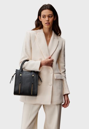 nat & nin STRIKE - Sac à main - black/noir - ZALANDO.FR