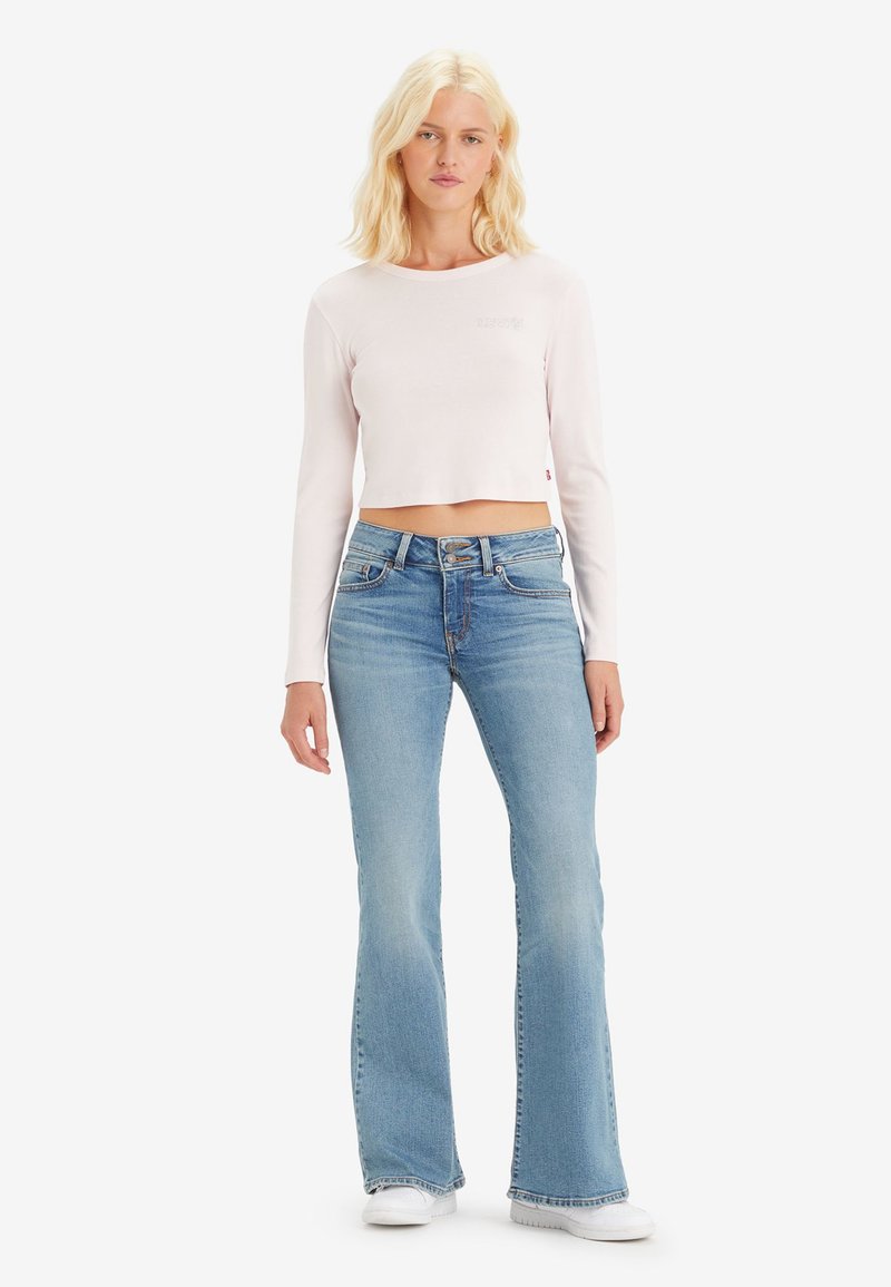 Levi's® SUPERLOW FLARE - Flared Jeans - the big idea/blue denim ...