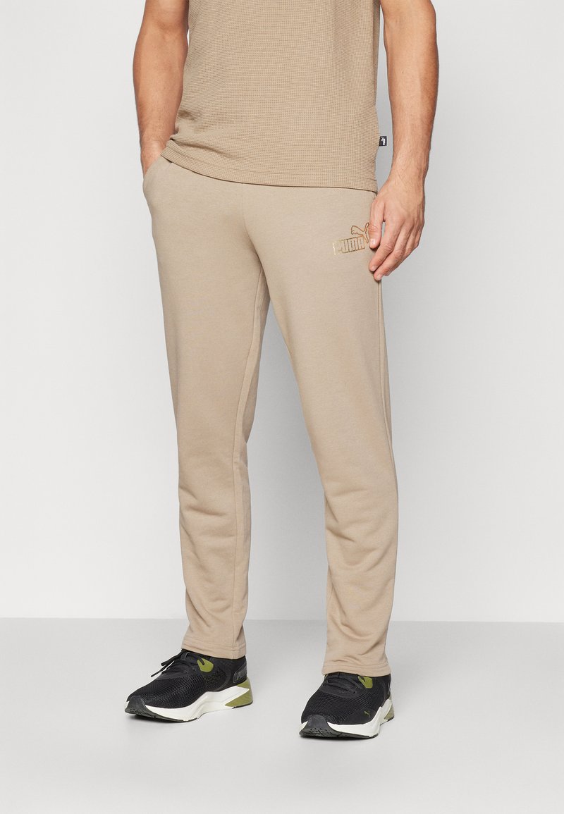 Puma MENS PANTS OPEN - Tracksuit bottoms - oak branch/sand - Zalando.co.uk