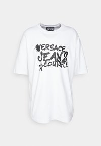Versace Jeans Couture LOGO DRIPPING - T-shirt print - white/wit ...