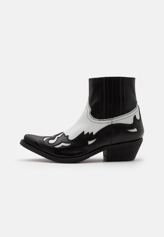 Kowbojki i buty motocyklowe męskie w Zalando