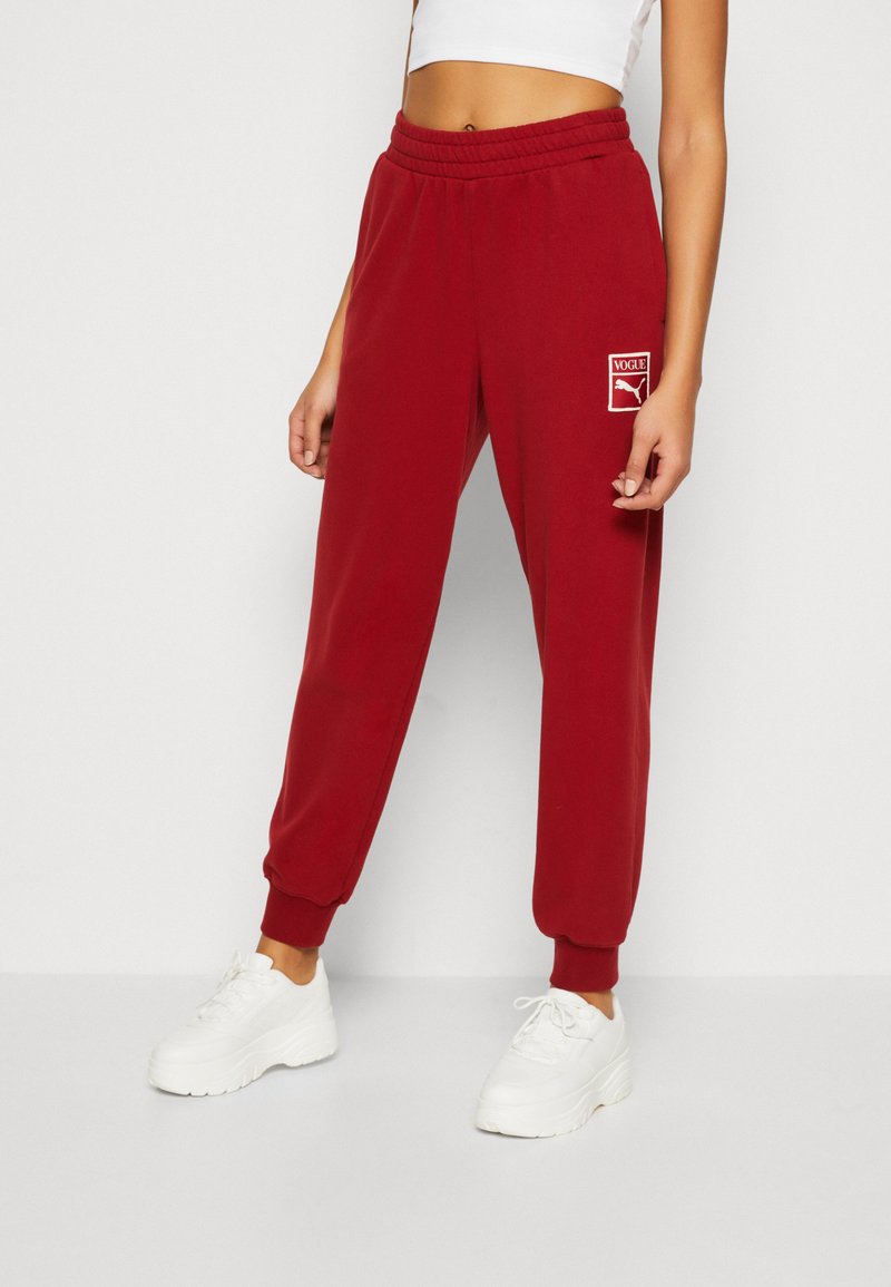Puma RELAXED SWEATPANTS - Tracksuit bottoms - intense red/red - Zalando ...