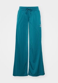 Puma CLASSICS POPPER - Tracksuit bottoms - cold green/green - Zalando.co.uk