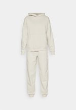 Puma LOUNGEWEAR TRACKSUIT SET - Tracksuit - desert dust/beige - Zalando ...