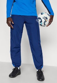Nike Performance Pantalon de survêtement - blue void/game royal/white ...