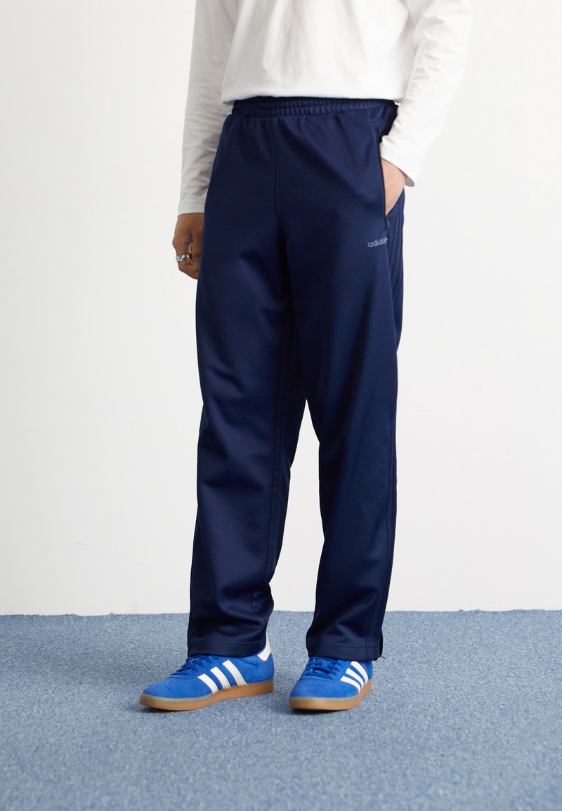 adidas Originals ARCHIVE TRACK PANTS - Tracksuit bottoms - night indigo ...