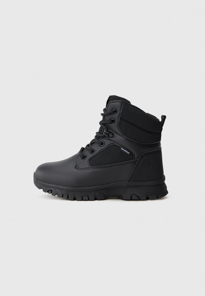 Calvin Klein Jeans NEIL UNISEX - Vinterstövlar - black/svart - Zalando.se