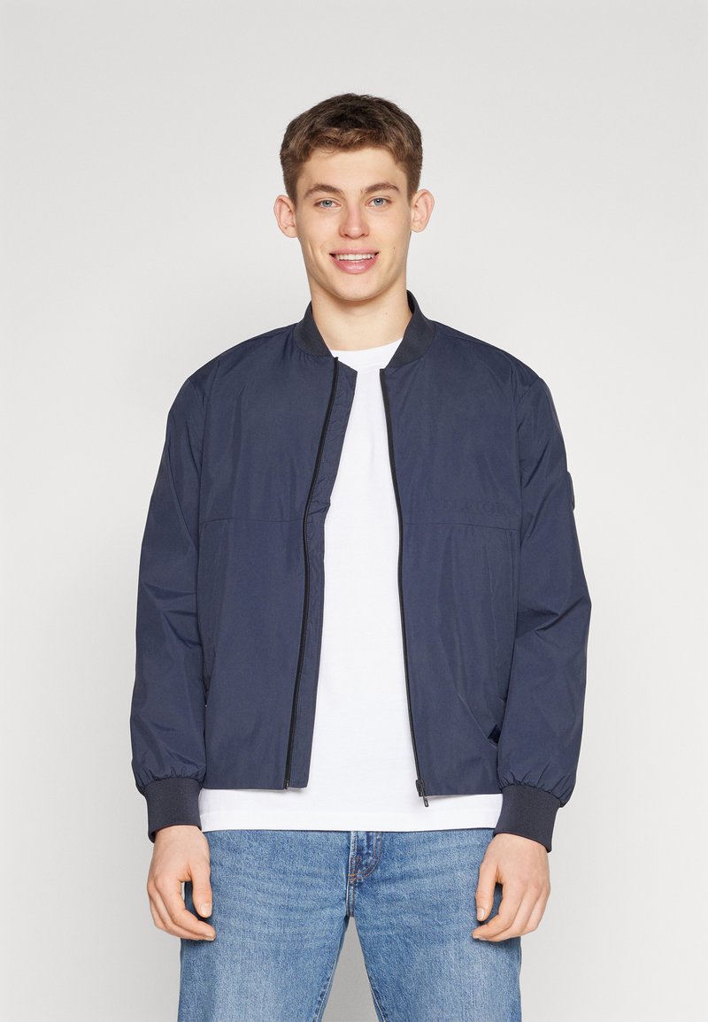 Tommy Hilfiger PORTLAND - Bomberjacke - desert sky/dunkelblau - Zalando.ch