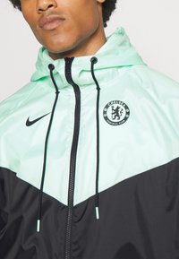 Nike Performance CHELSEA LONDON WINDRUNNER HOODED JACKET - Fanartikel - mint foam/black ...