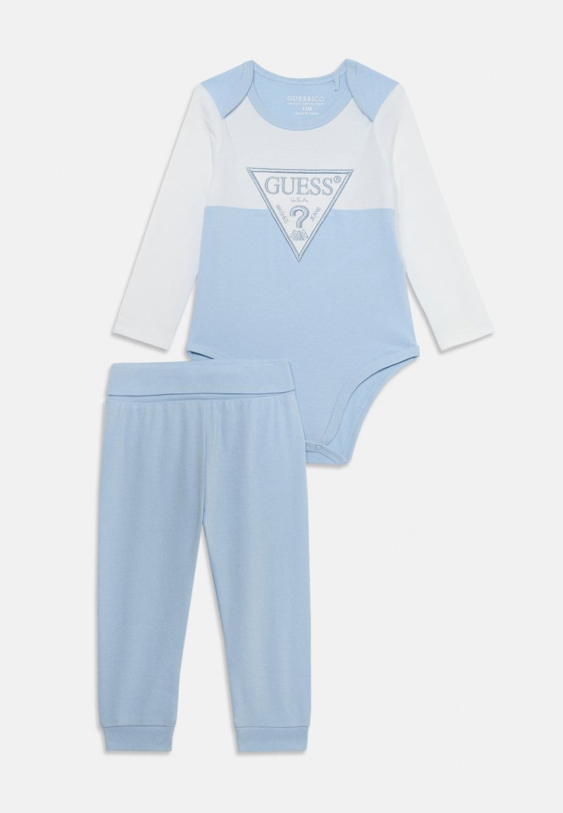Guess BABY PANTS SET UNISEX - Tracksuit bottoms - light blue/white/blue ...