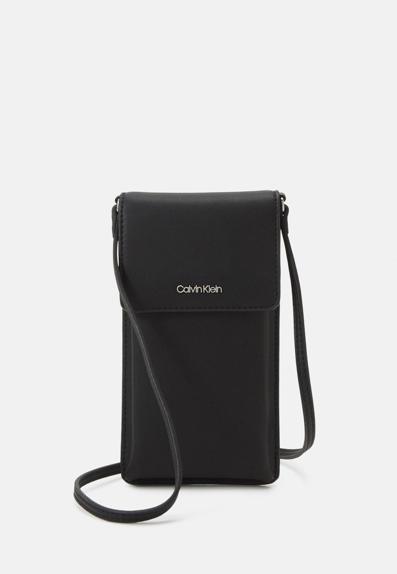 Calvin Klein MUST PHONE POUCH XBODY - Phone case - black - Zalando.ie