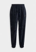 Levi's® GRAPHIC LAUNDRY - Tracksuit bottoms - total eclipse/dark blue ...
