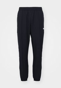 Reebok Classic COURT PANT - Tracksuit bottoms - black - Zalando