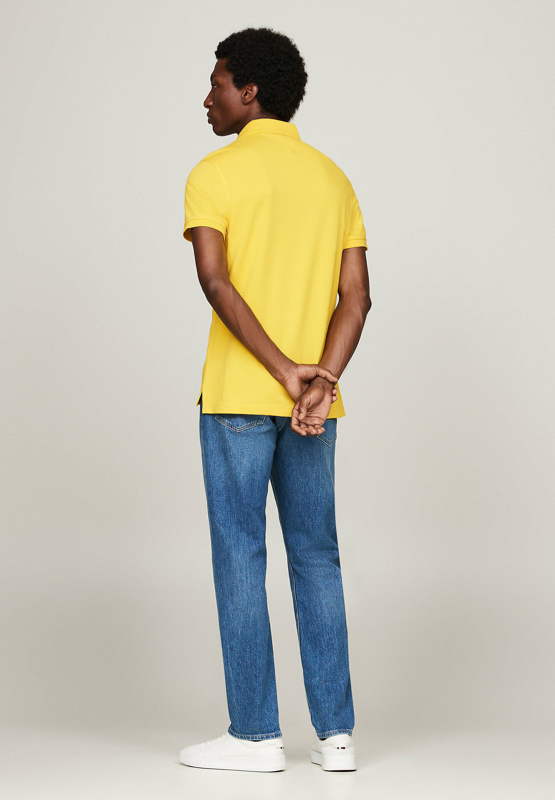 Tommy hilfiger yellow polo shirt store