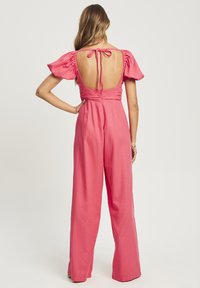 SÁVEL DIAZ - Tuta jumpsuit - watermelon pink/rosa - Zalando.it