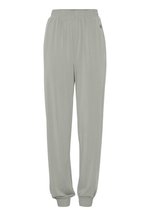 Oxmo BRIANNA - Tracksuit bottoms - seagrass/evergreen - Zalando.ie