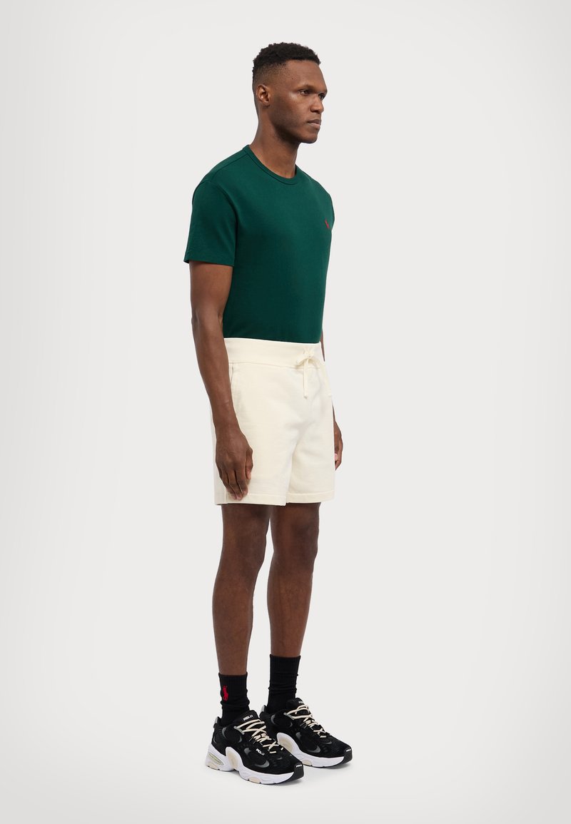 Polo Ralph Lauren ATHLETIC SHORT - Tracksuit bottoms - clubhouse cream ...
