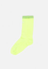 Nike Performance SPARK CREW UNISEX - Sports socks - volt/reflective ...
