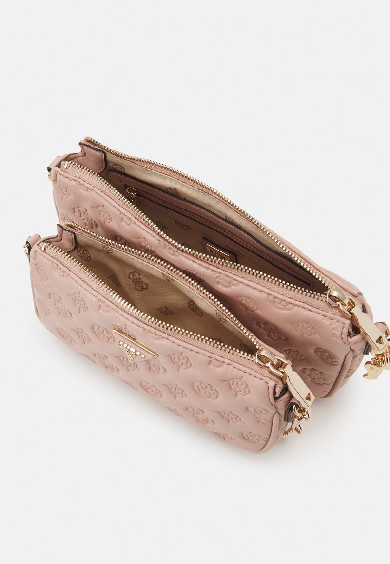 Guess Across body bag - pale rose/pink - Zalando.ie