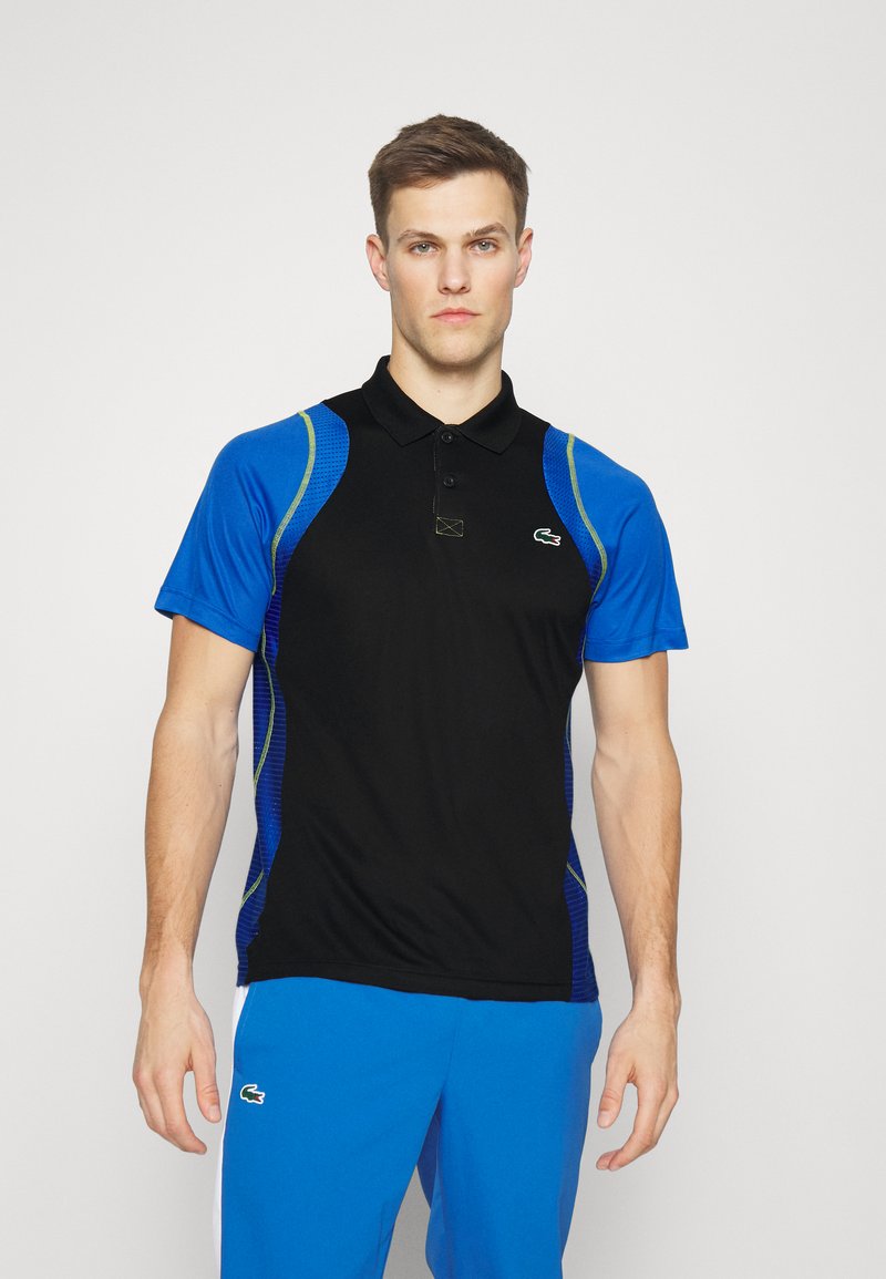 Lacoste Sport TENNIS TOUR - Polo - noir/bleu/jaune/nero - Zalando.it