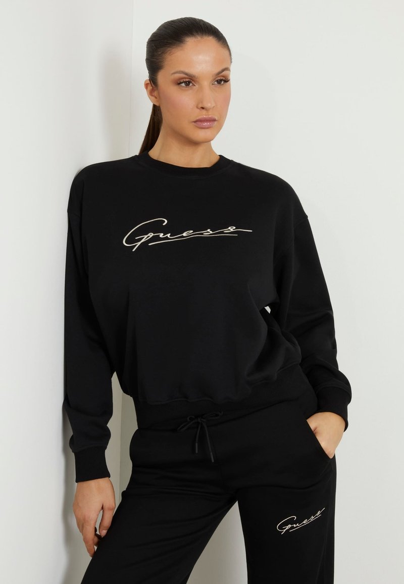 Guess LOGOSTICKEREI - Sweater - schwarz/zwart - Zalando.nl