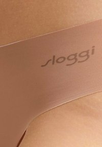 Sloggi HIPSTRING WEICH LEICHT UNSICHTBAR S 4 PACK - String - beige ...
