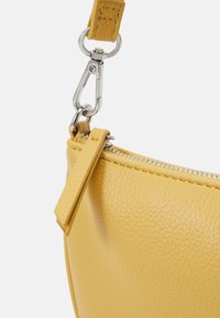 Lindex BAG MINI SUNNY - Taška cez plece - light dusty yellow/svetložltá ...
