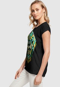 ABSOLUTE CULT AQUAMAN - THE TRENCH CREST - T-Shirt print - black ...