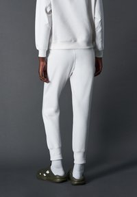 Champion TECH AMERICAN TECH - Jogginghose - offwhite - Zalando.at