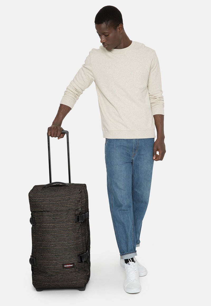 Eastpak TWINKLE - Wheeled suitcase - gold/black - Zalando.de