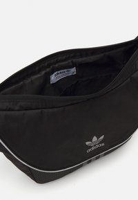 adidas Originals SHOULDER - Cross body bag - black/reflective silver ...
