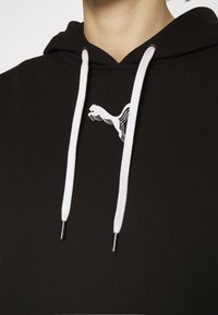 Puma ARCHITECT HOODIE - Jersey con capucha - Black/negro - Zalando.es