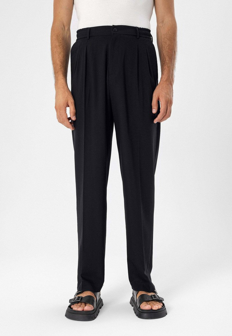 Antioch BASIC - Kalhoty - black/skvrnitě černá - Zalando.cz