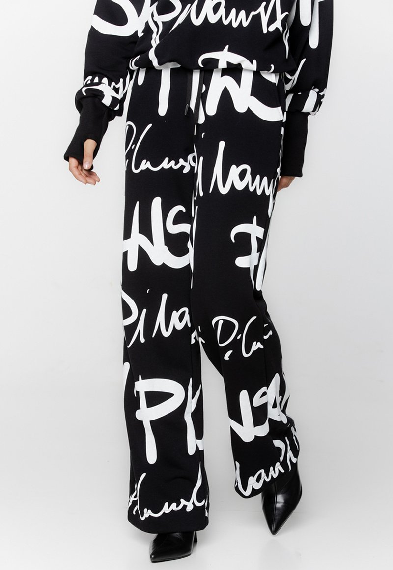PILAWSKI - Spodnie treningowe/czarny - Zalando.pl