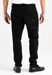Butcher of Blue SACRAMENTO - Jeans Slim Fit - black/black denim ...