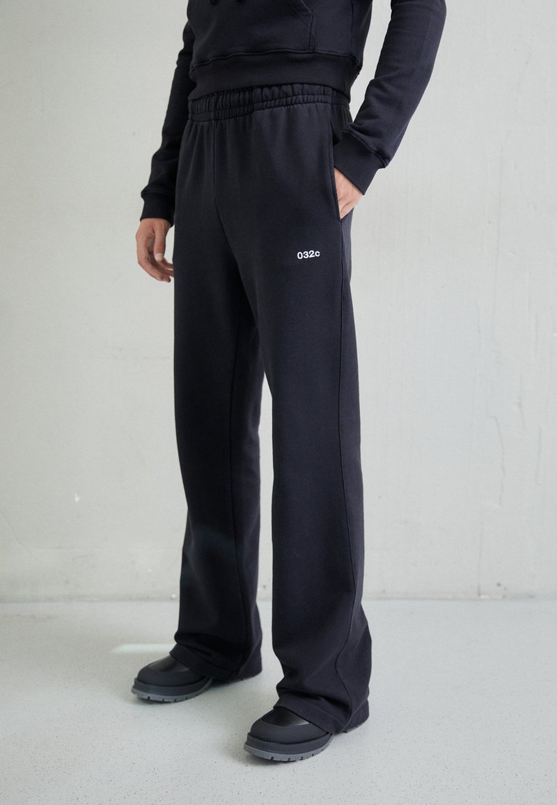 032c TOPLAYER WIDE FLARE PANTS UNISEX - Tracksuit bottoms - washed ...
